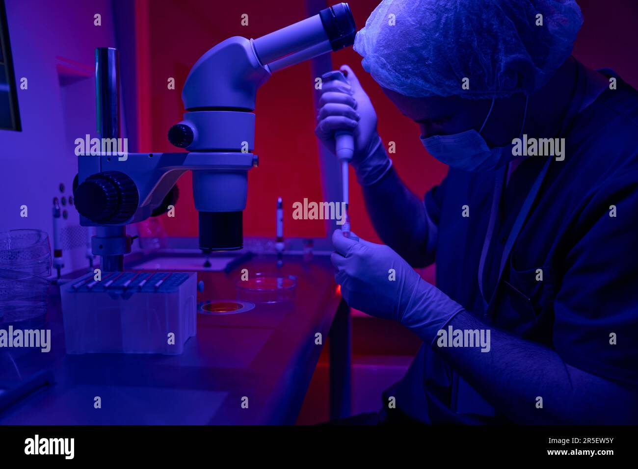 Genetic laboratory researcher taking sample from test tube Stock Photo ...