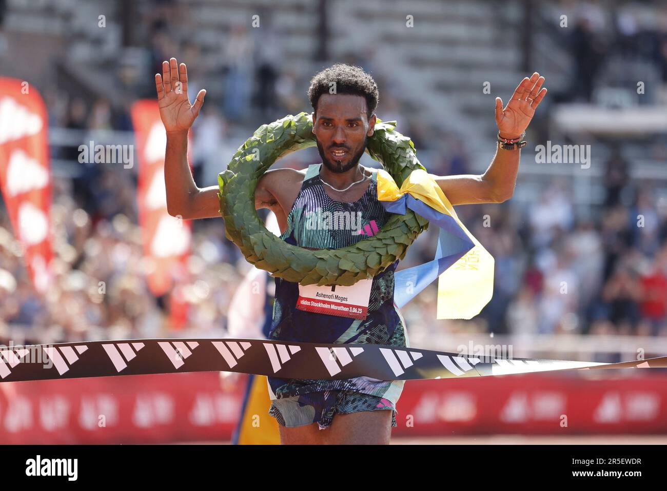 Ethiopia's Ashenafi Moges crosses the finish line of the Stockholm ...