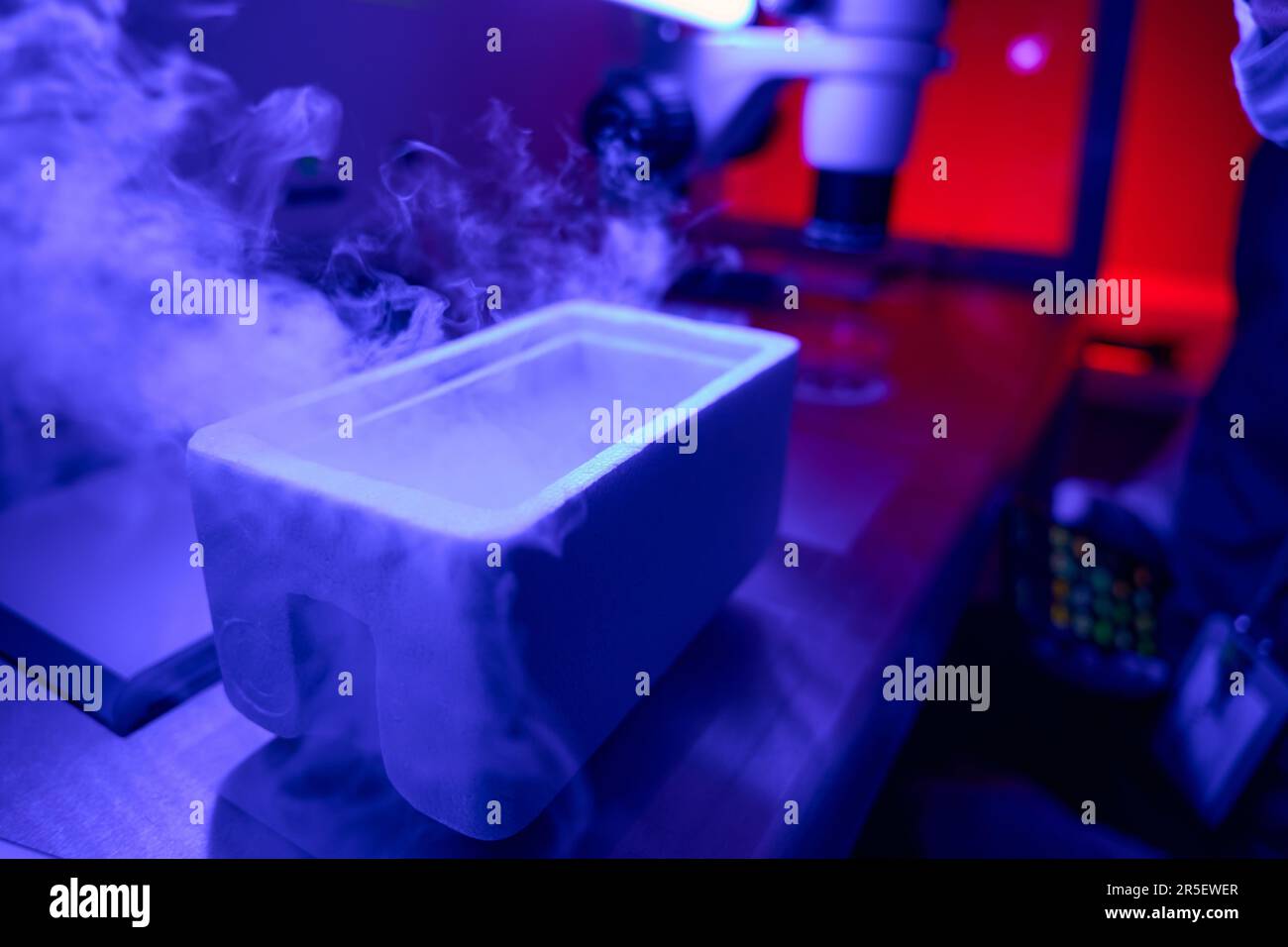 Cold smoke from liquid nitrogen rising above cuvette Stock Photo - Alamy