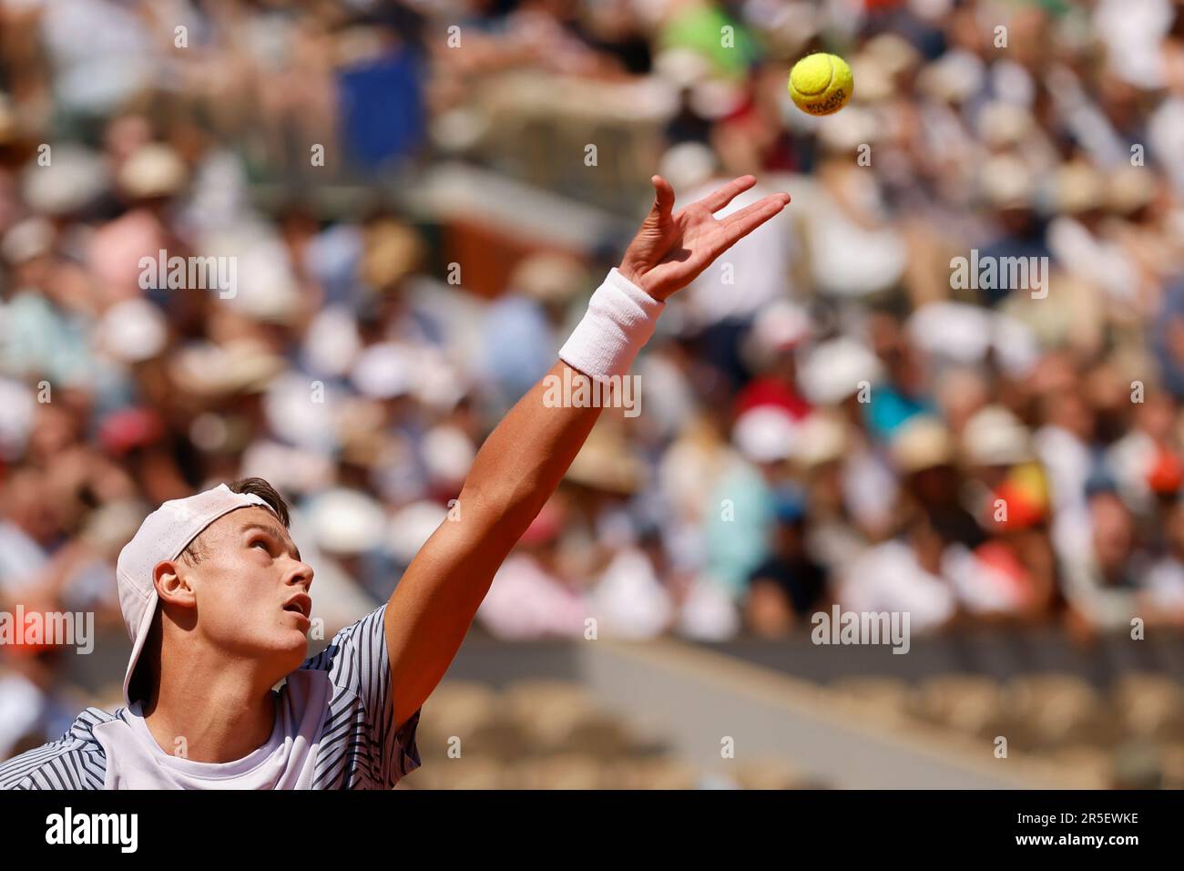 Denmark's Holger Rune serves against Argentina's Genaro Alberto ...