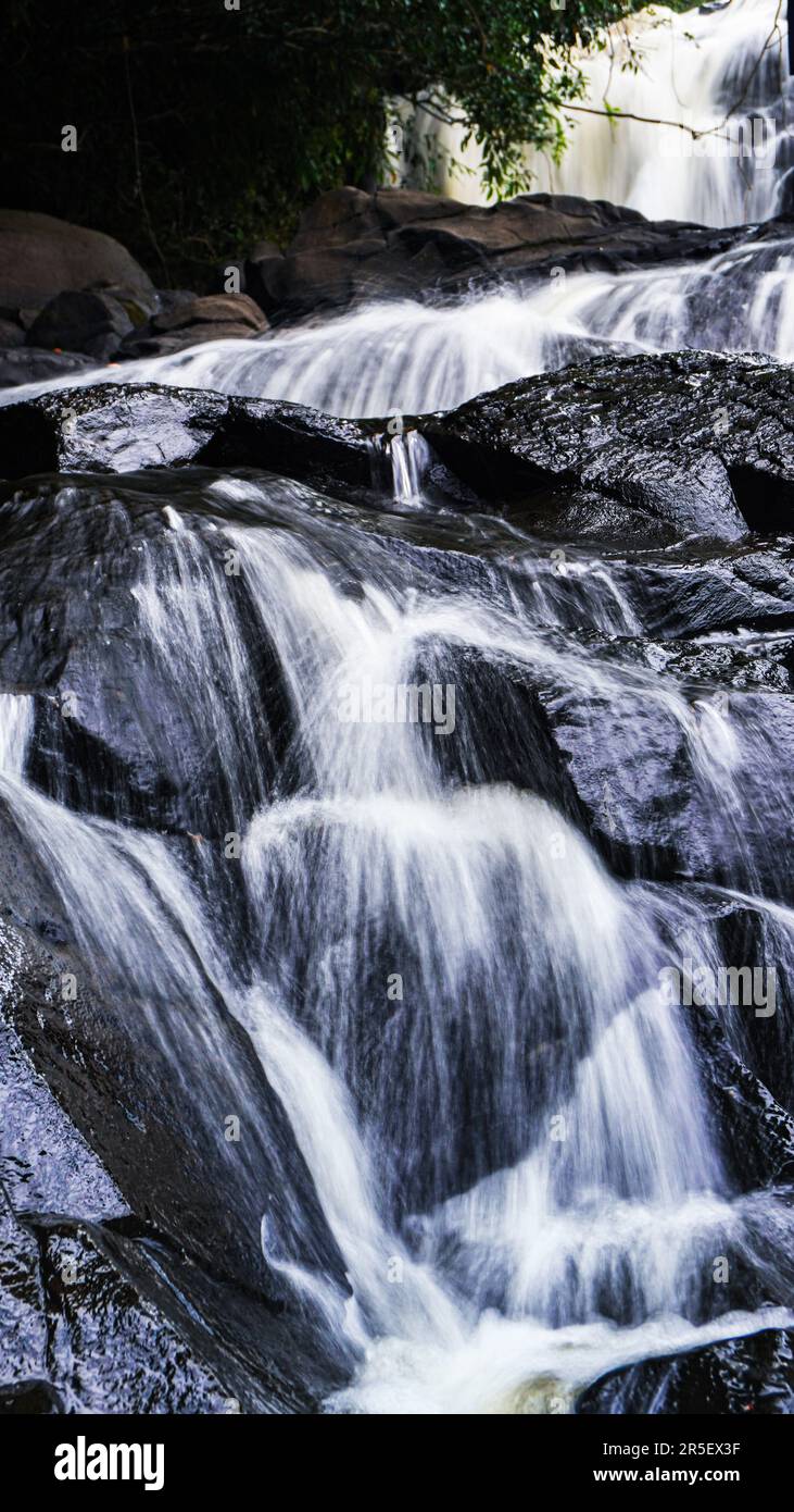 Waterfall with super smooth expanse of rocks and water Stock Photo - Alamy