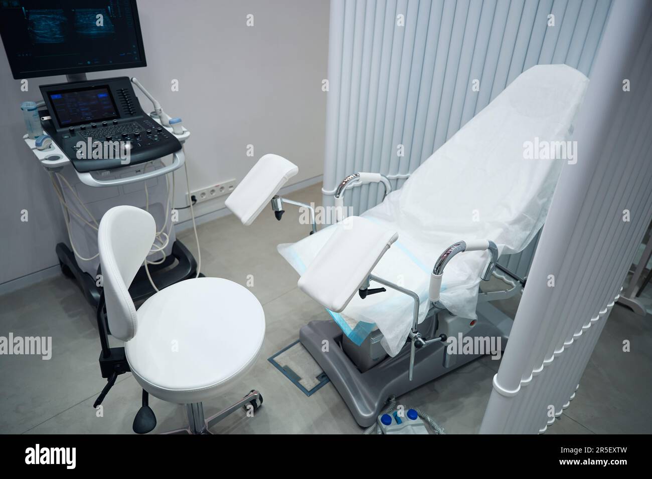 Photo of gynecologist office which houses equipment for examining ...