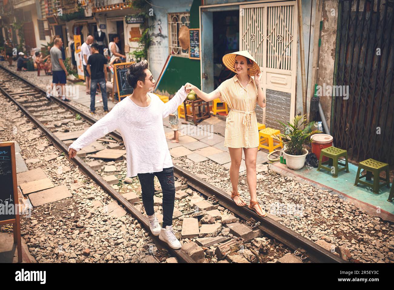 Caucasian men asian woman walking hi-res stock photography and images ...