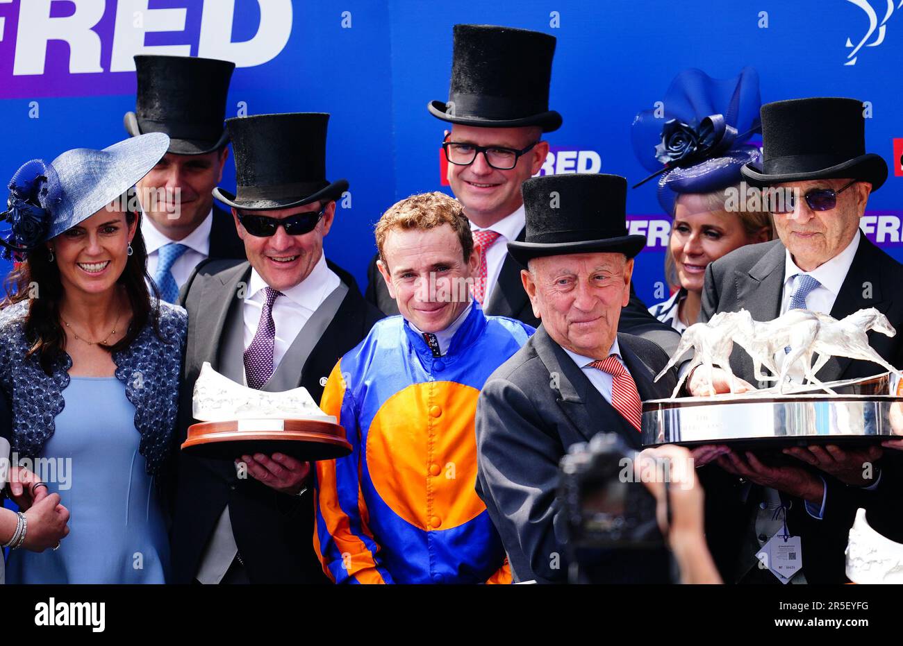 Ryan Moore and connections celebrate winning the Betfred Derby with ...