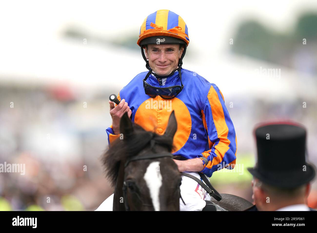 Jockey Ryan Moore celebrates after winning the Betfred Derby with horse ...