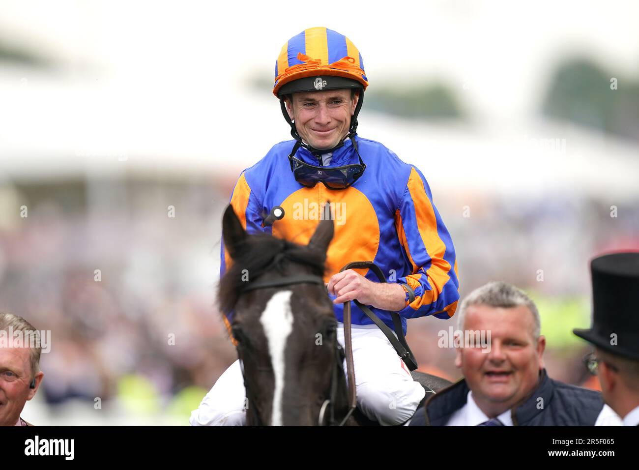 Jockey Ryan Moore celebrates after winning the Betfred Derby with horse ...