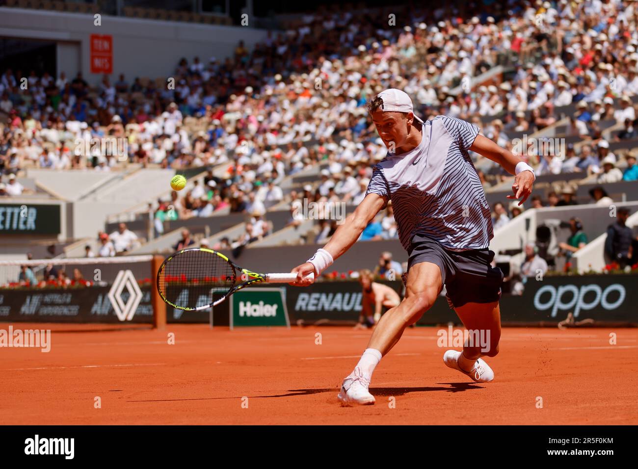 Denmark's Holger Rune plays a shot against Argentina's Genaro Alberto ...