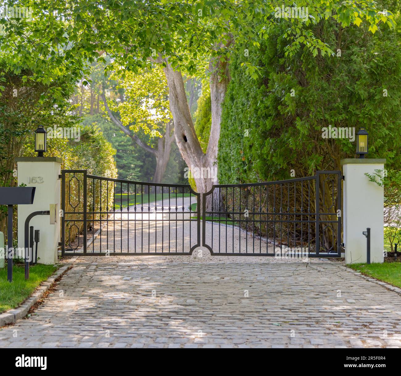 Gate and drive at 163 south main street, southampton, ny Stock Photo ...