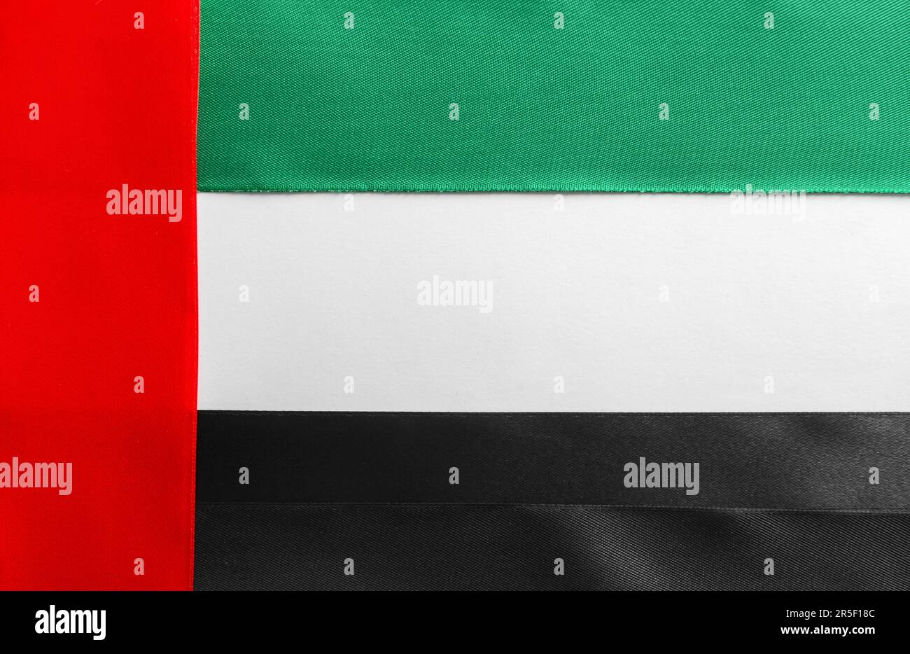 Ribbons in colors of UAE flag on white background Stock Photo - Alamy