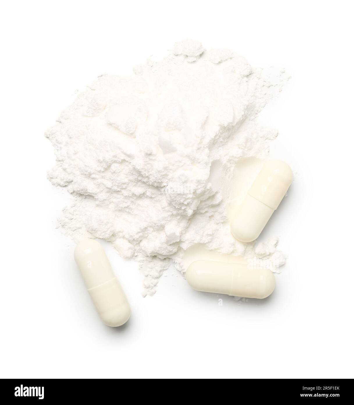 Amino acid pills and powder on white background Stock Photo - Alamy