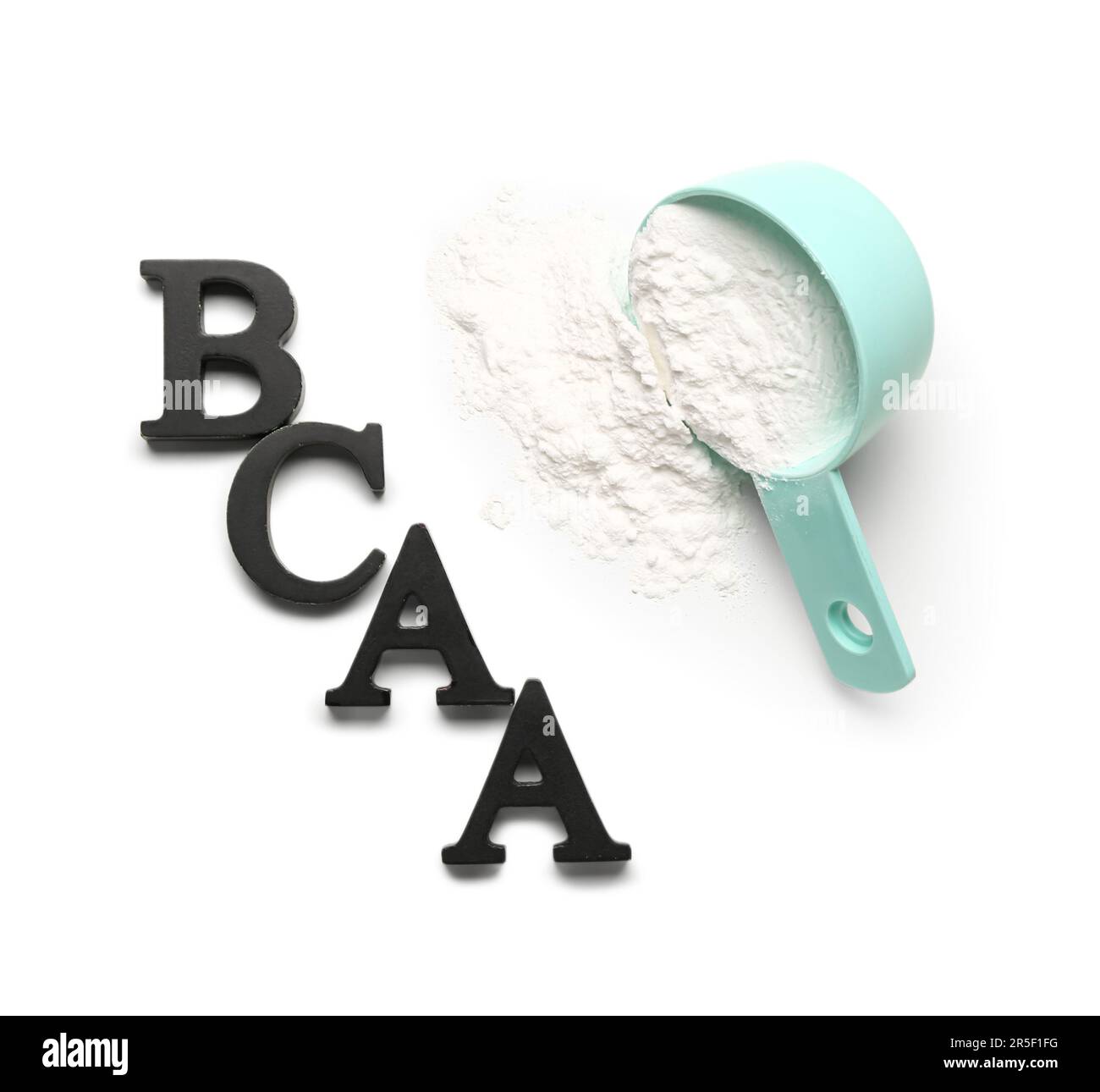 Letters BCAA and scoop of amino acid supplement on white background ...