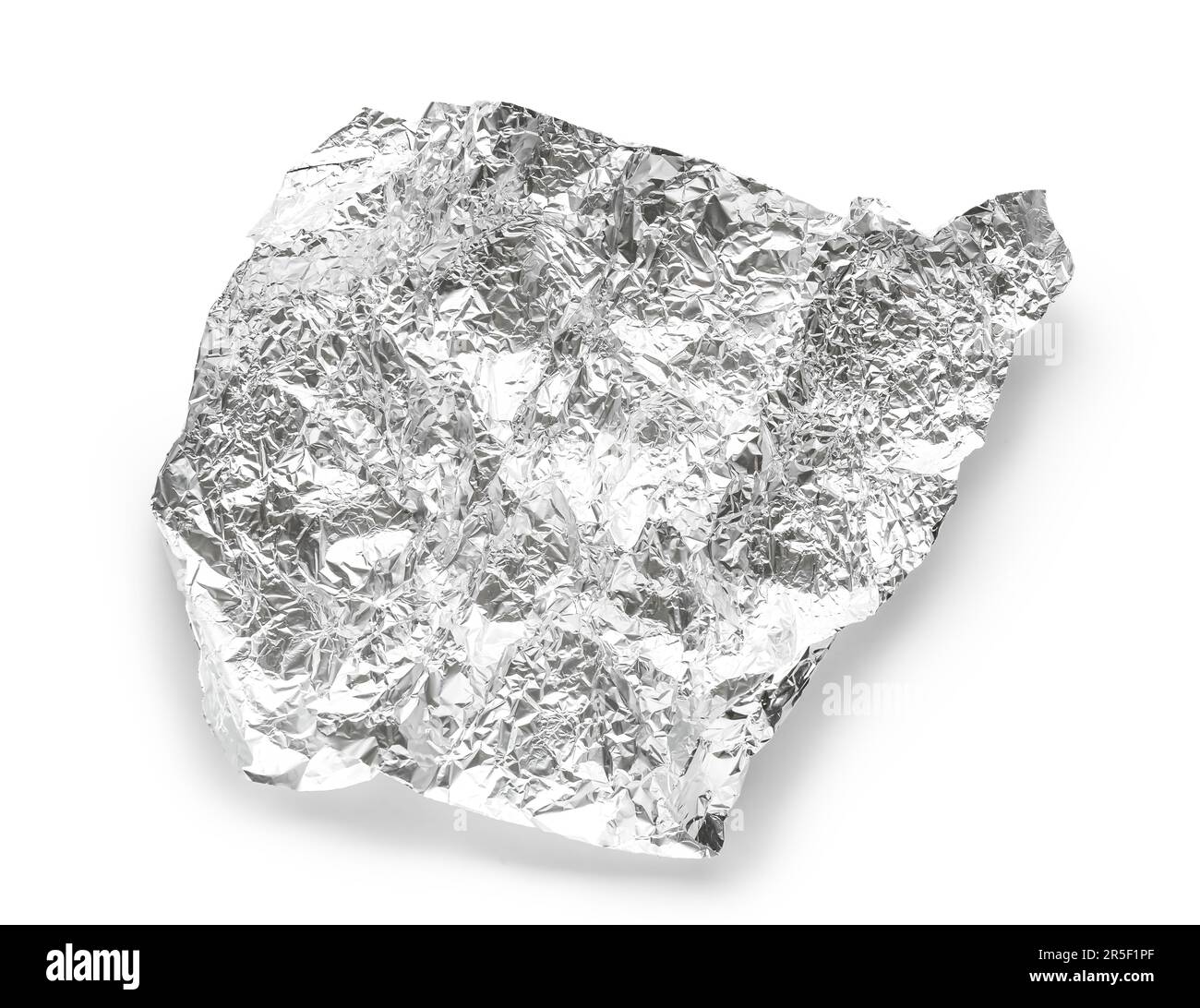 Crumpled sheet of aluminium foil on white background Stock Photo - Alamy