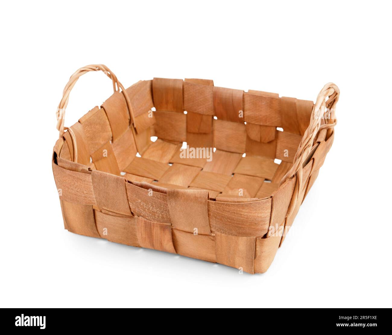 Stylish wicker basket on white background Stock Photo - Alamy