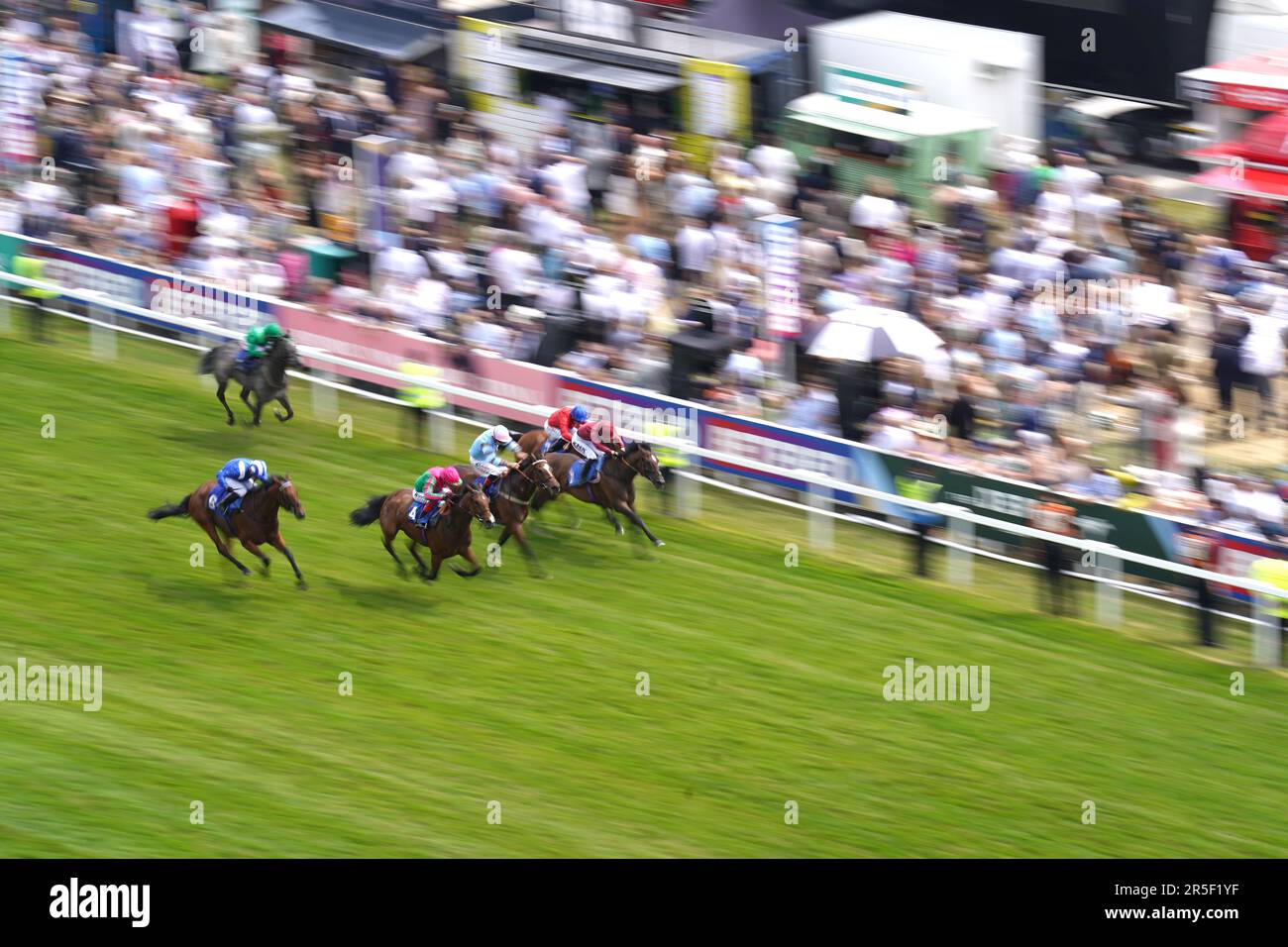 Prosperous Voyage ridden by jockey Frankie Dettori (in pink, no 4) wins ...