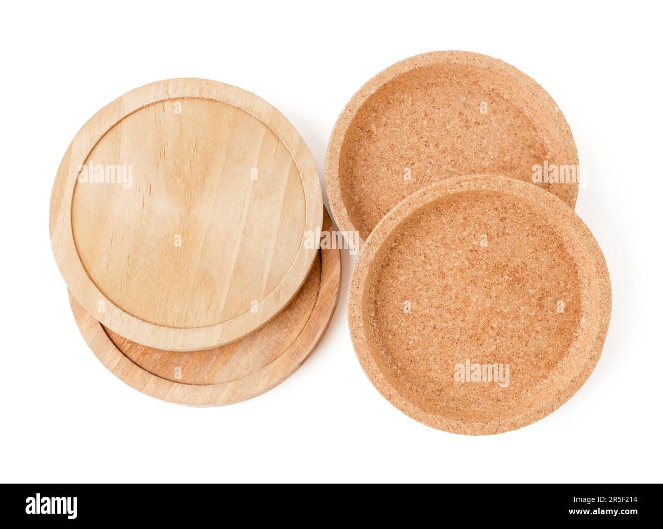Wooden kitchen boards and cork plates on white background Stock Photo ...