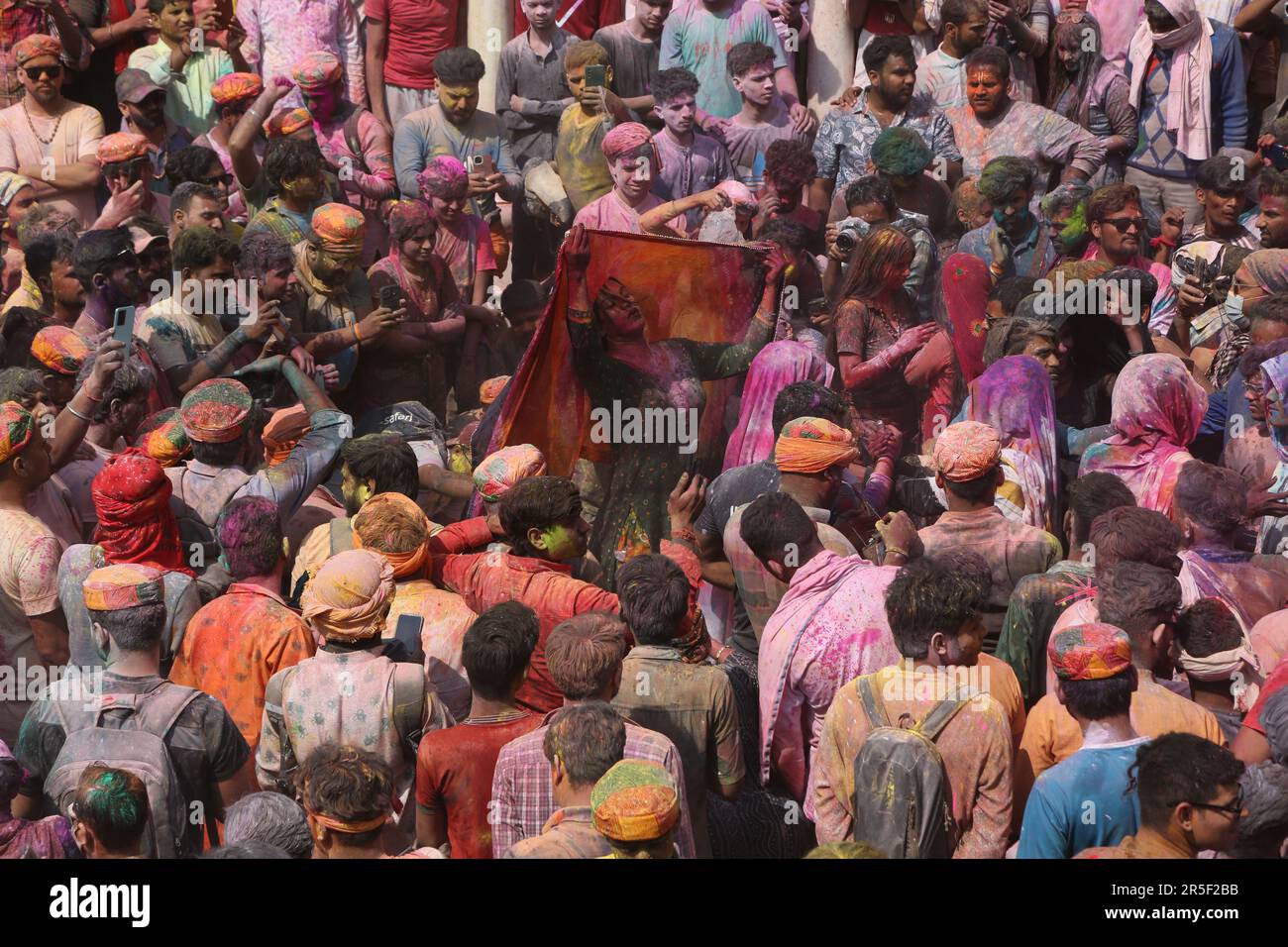 Crowd during Holi in Nandgaon temple, India Stock Photo - Alamy