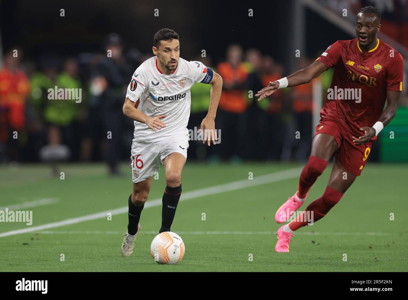 Budapest, Hungary, 31st May 2023. Jesus Navas of Sevilla is pursued by ...
