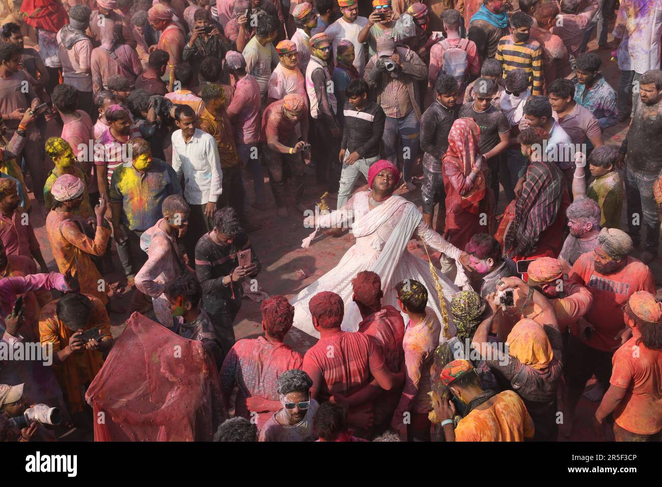 Crowd during Holi in Nandgaon temple, India Stock Photo - Alamy