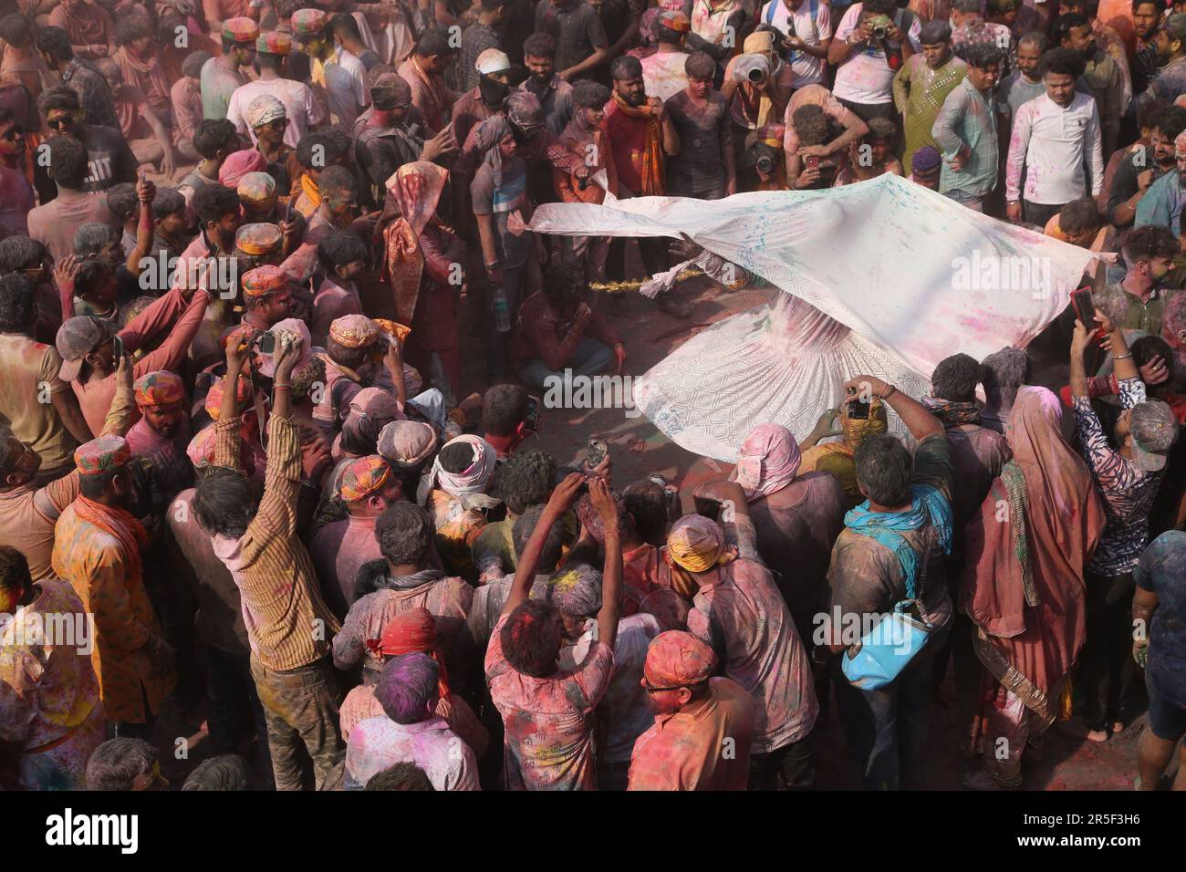 Crowd during Holi in Nandgaon temple, India Stock Photo - Alamy