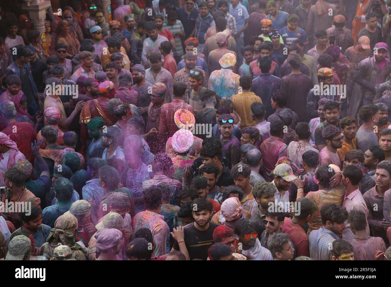 Crowd during Holi in Nandgaon temple, India Stock Photo - Alamy