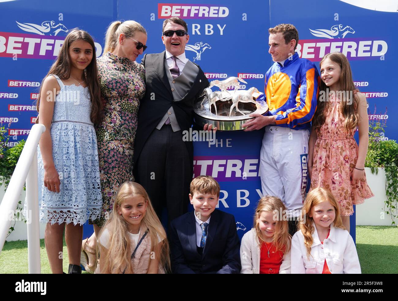 Ryan Moore (second right) and Trainer Aidan O'Brien (third left) pose ...