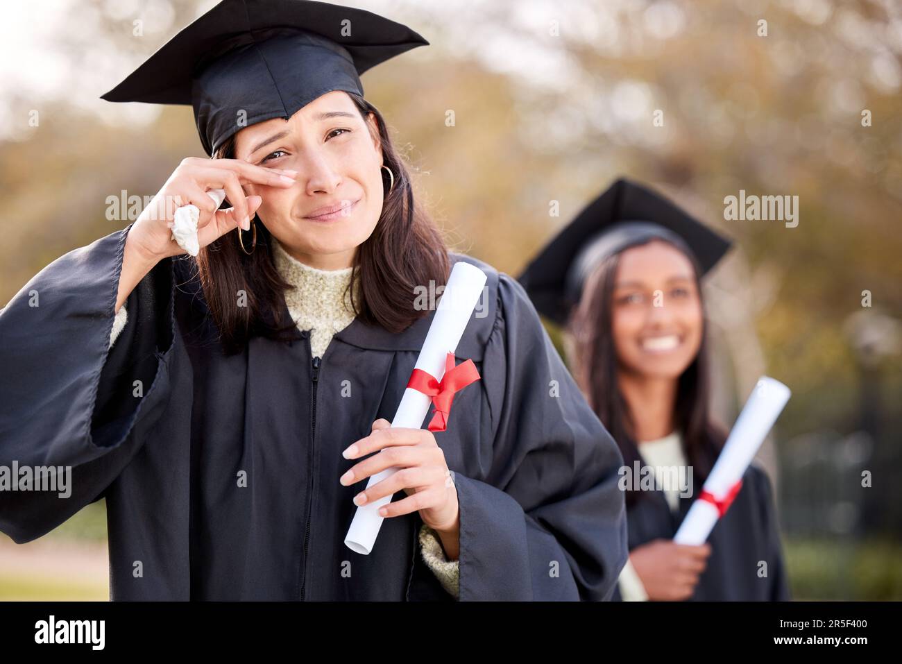 Woman graduate, portrait and happy crying at college, campus and ...