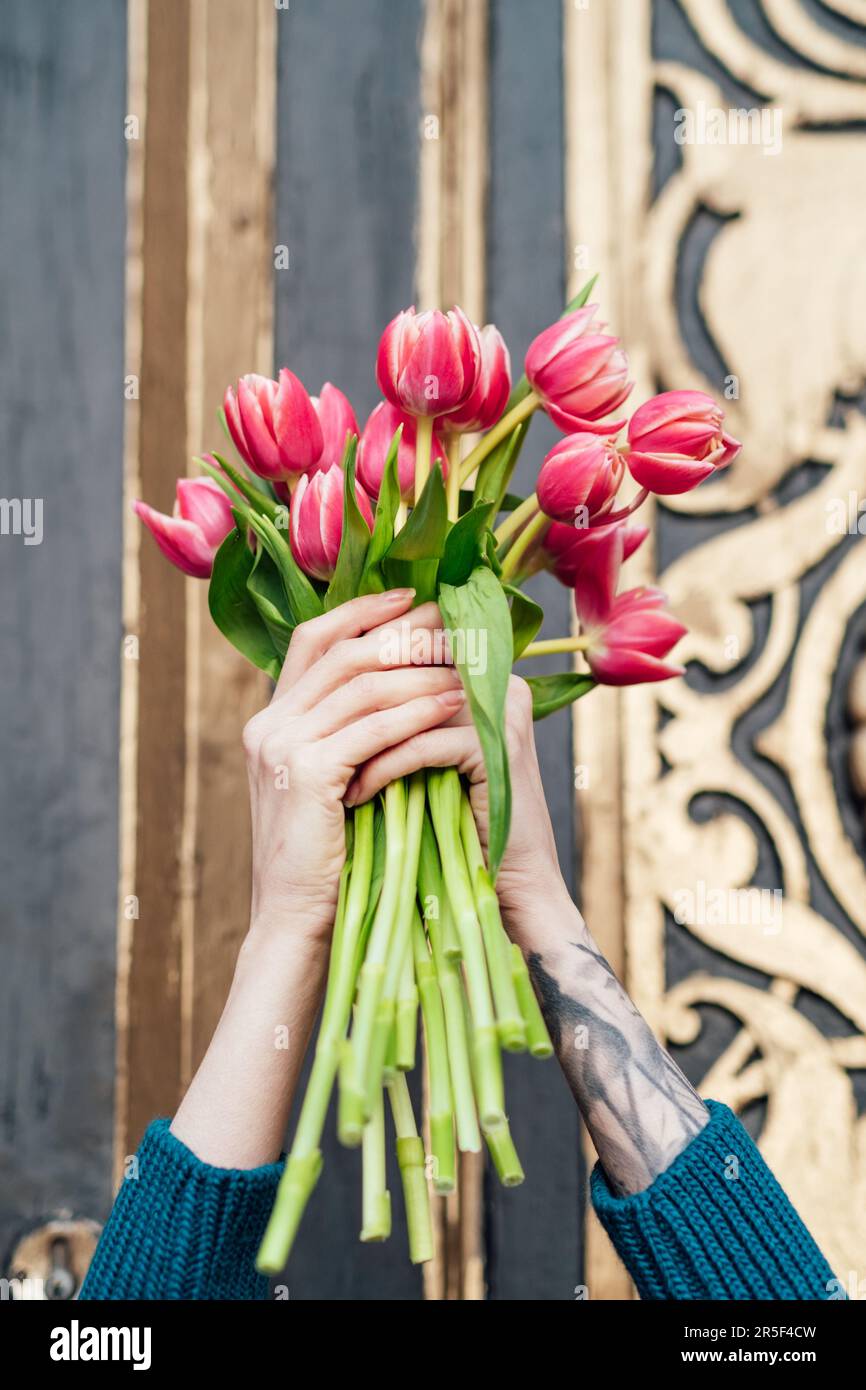 Self Care, Buy yourself flowers. Beautiful woman giving herself flowers ...