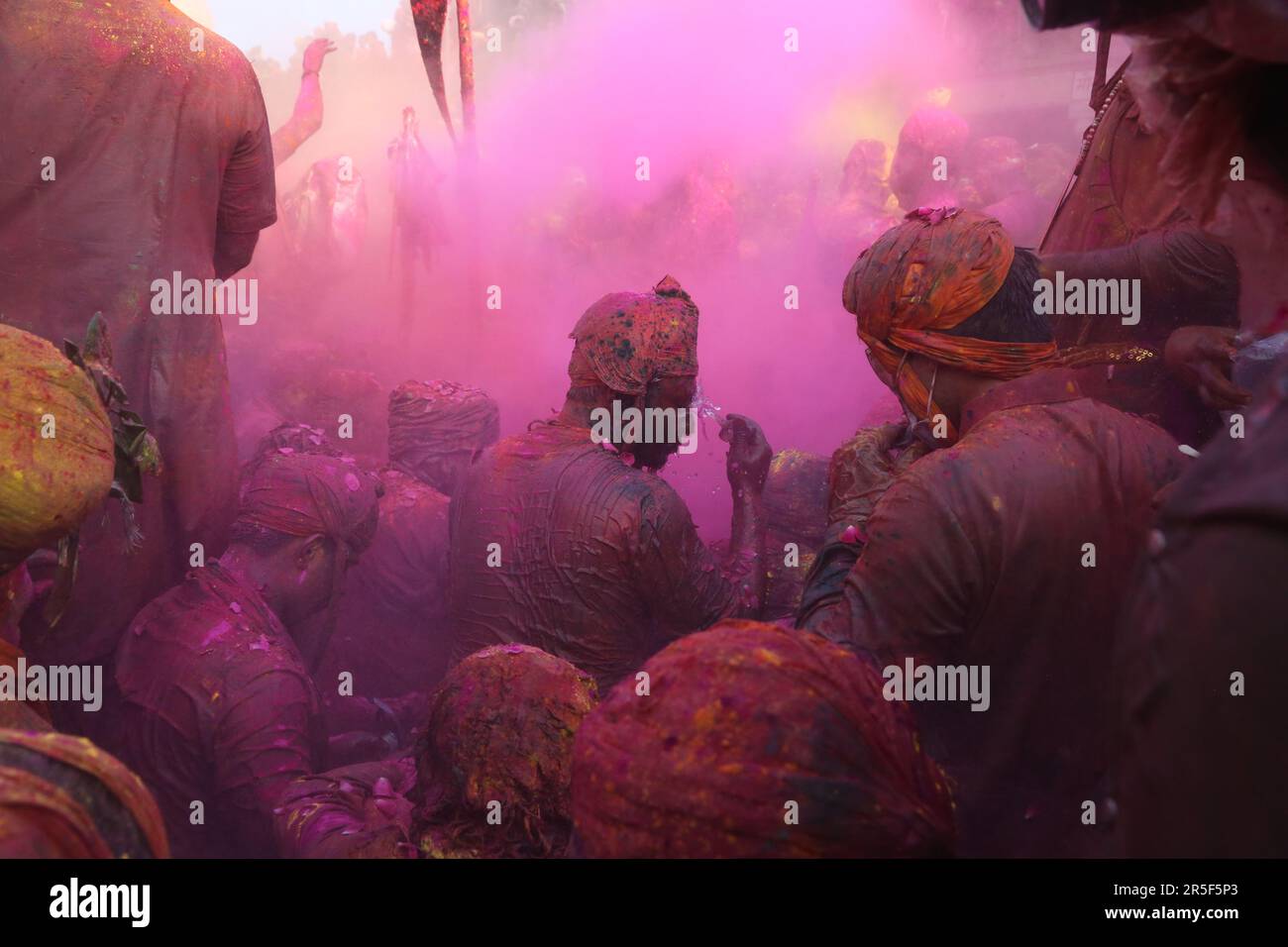 Crowd during Holi in Nandgaon temple, India Stock Photo - Alamy