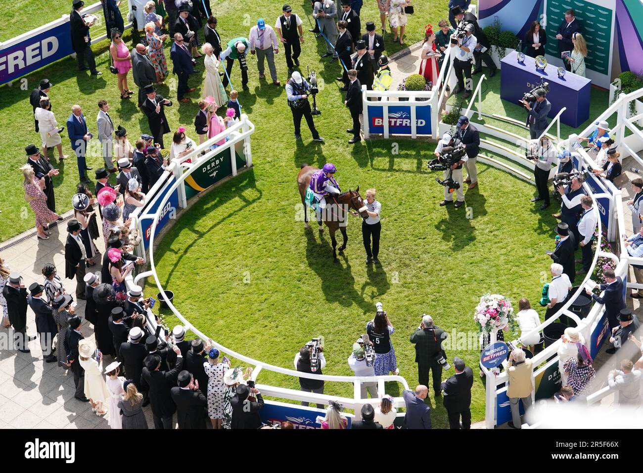 Jockey Connor Beasley and Tattershall arrive in the winners enclosure ...