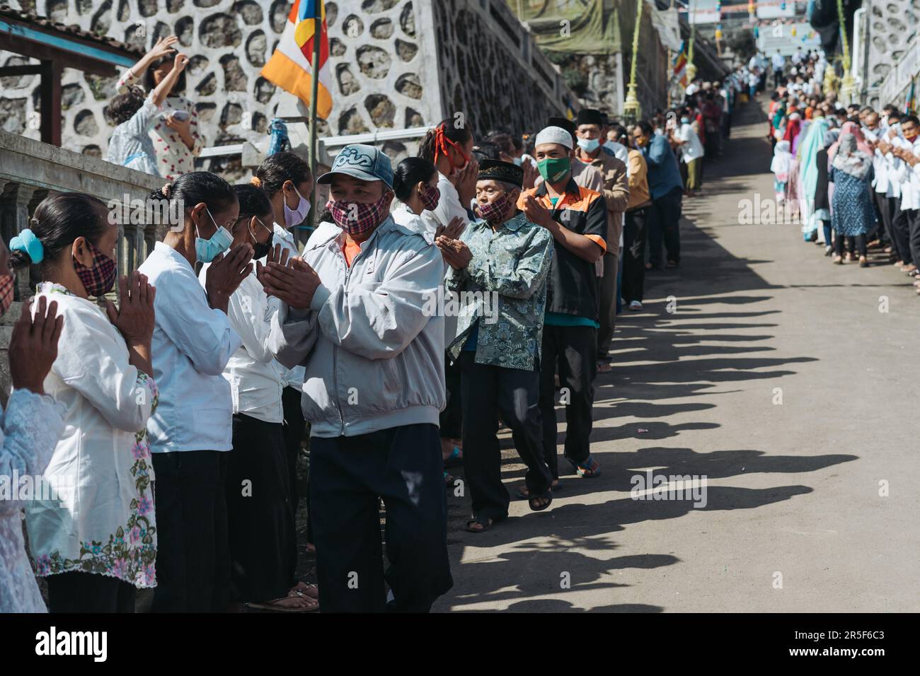 Muslim and all villagers shake hands and congratulate Buddhists who ...