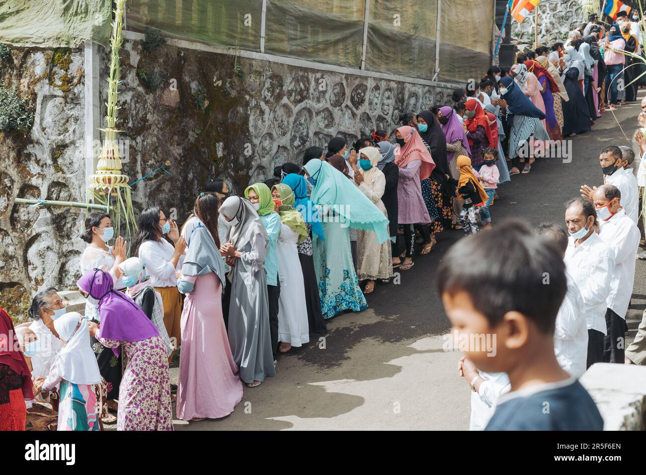 Muslim and all villagers shake hands and congratulate Buddhists who ...