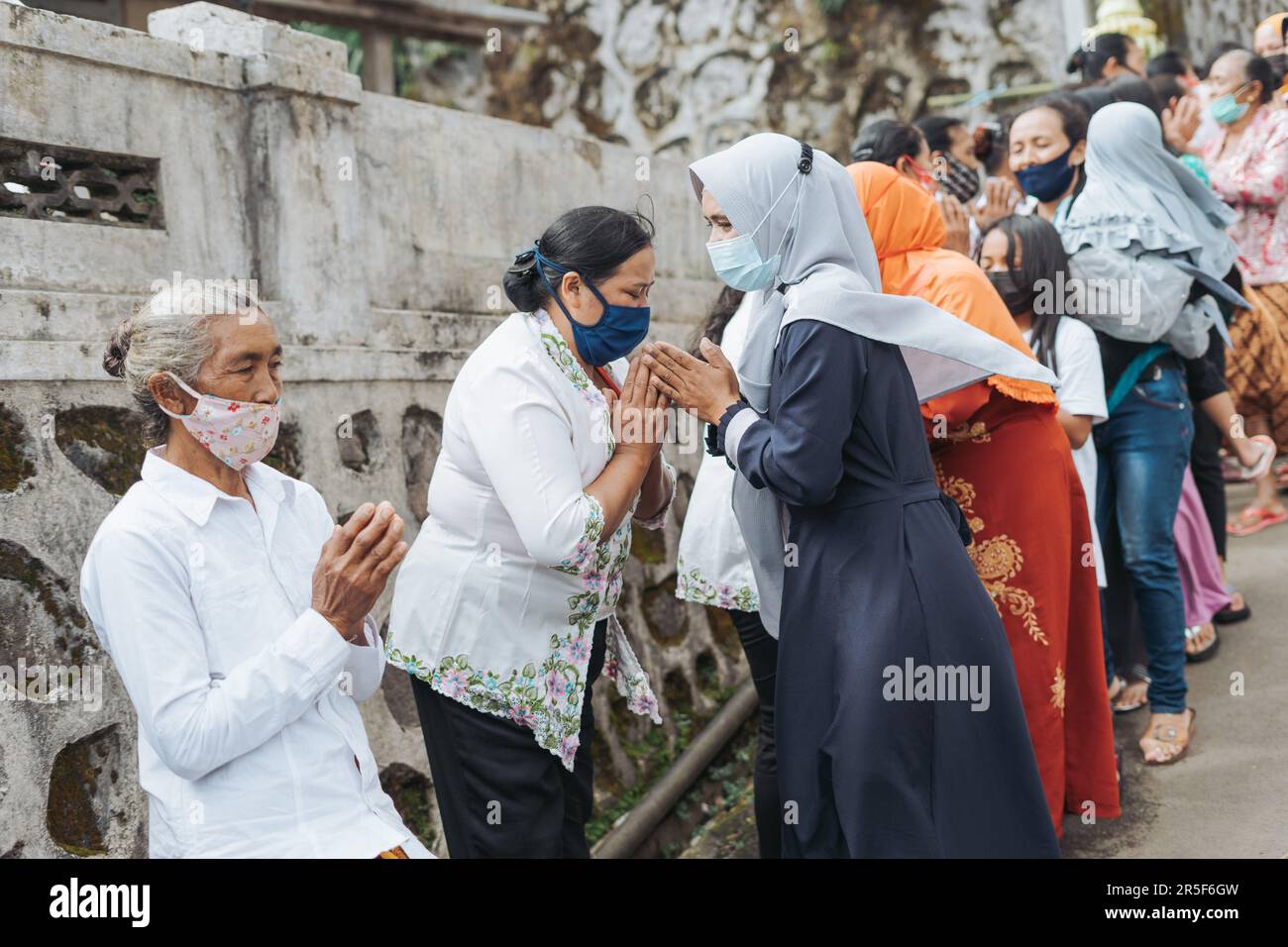 Muslim and all villagers shake hands and congratulate Buddhists who ...
