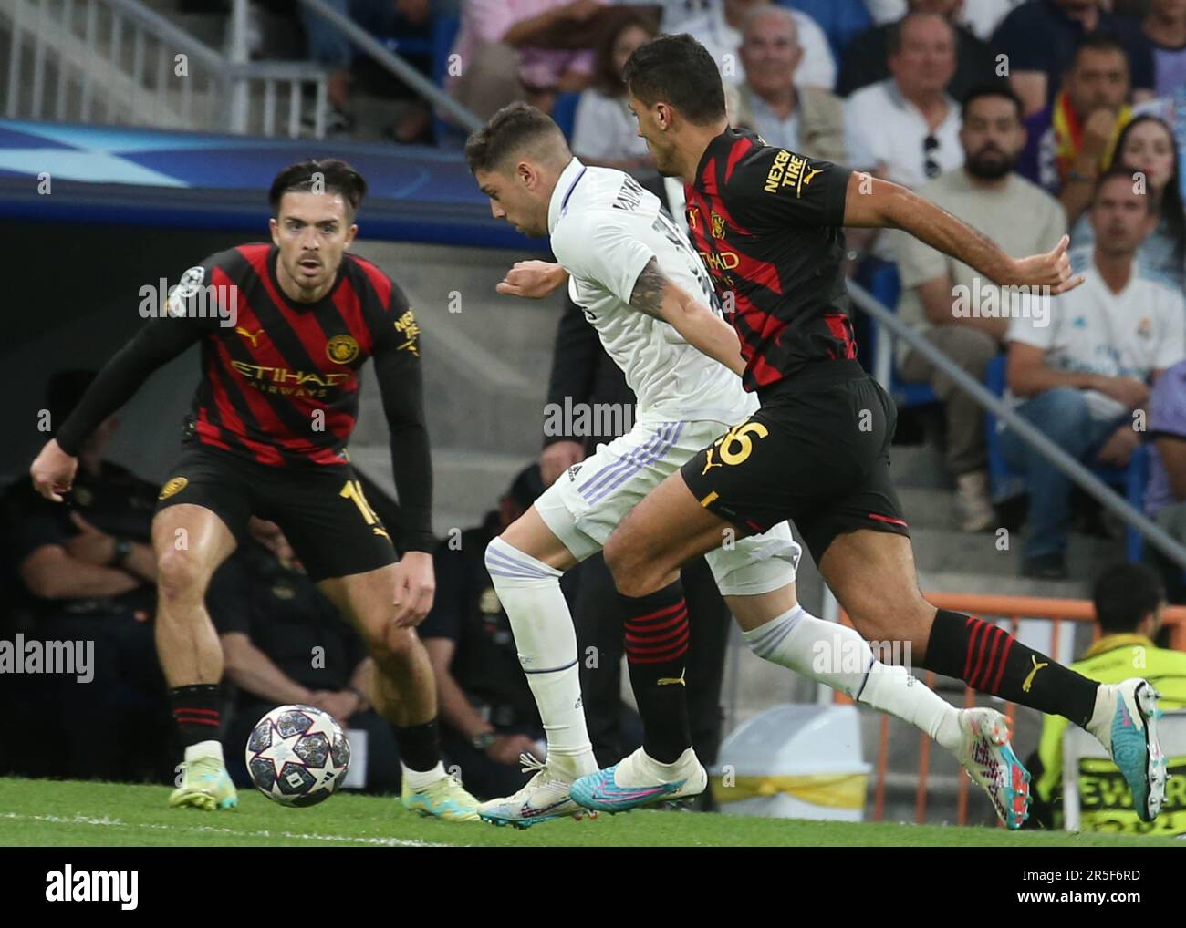 Rodri , Jack Grealish of Manchester City and Federico Valverde of Real ...