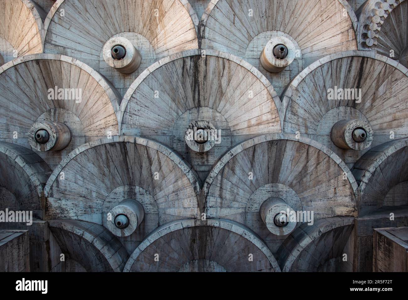 Modern fountain with the circular wheels form stones concept photo ...