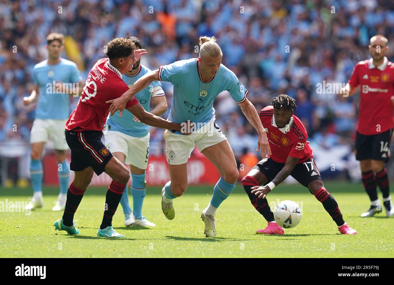 Manchester United's Raphael Varane (left) and Manchester City's Erling ...