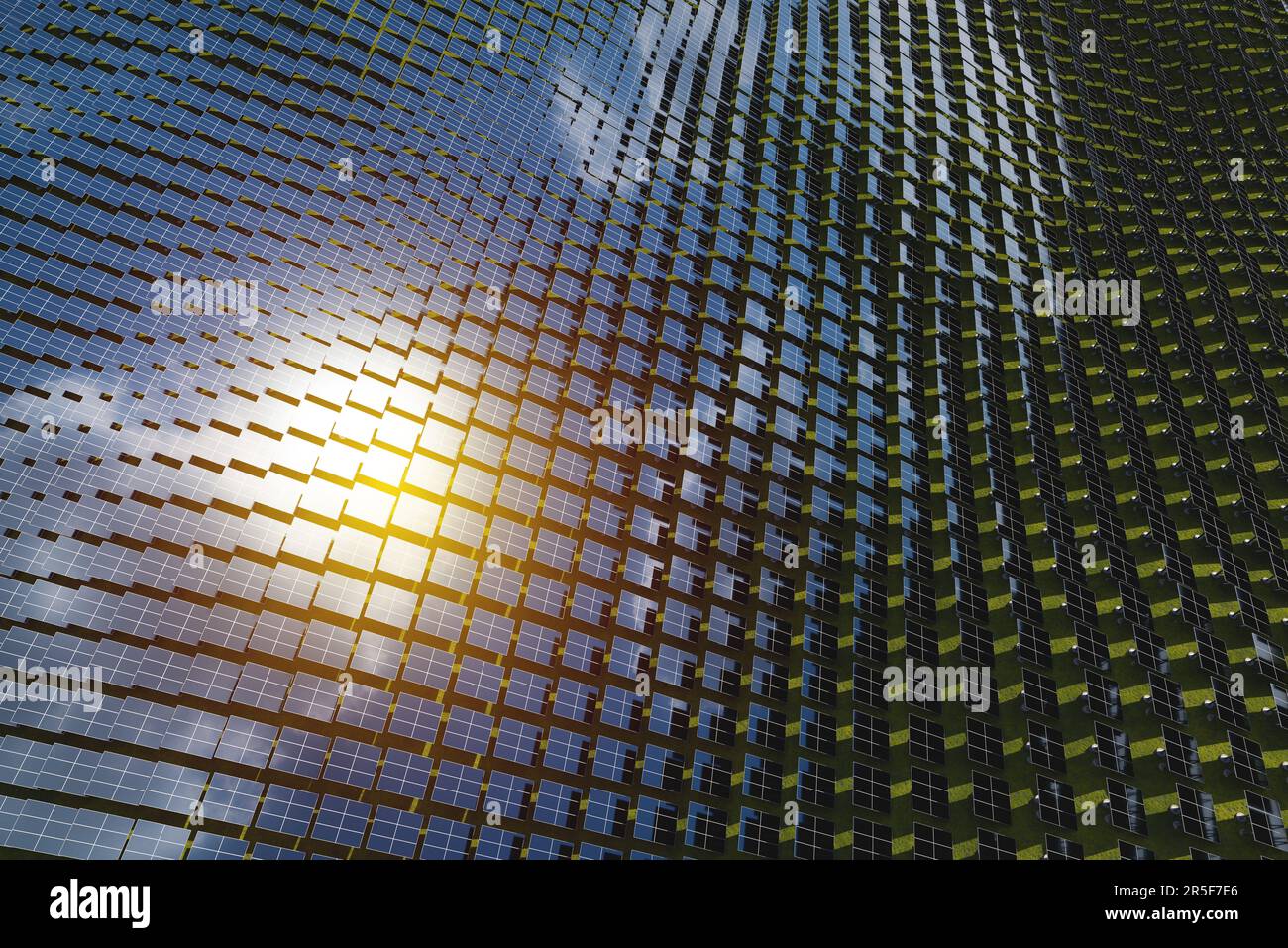 Lots of solar panels on a green field at sunset. Aerial view of the ...