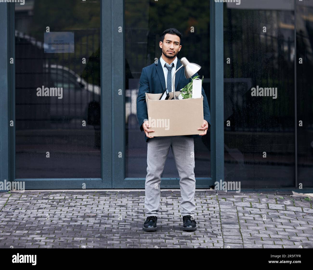 Depressed business man walking street hi-res stock photography and ...