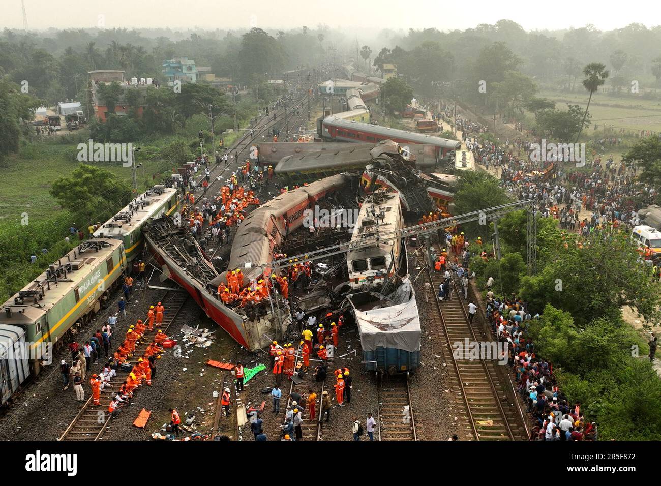A drone shot of rescuers work at the site of passenger trains accident, in Balasore district, in ...