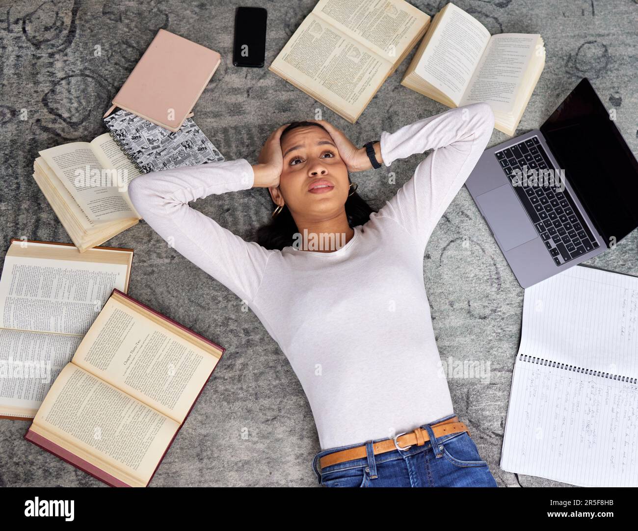 Study anxiety, burnout and woman student on ground with textbook for ...