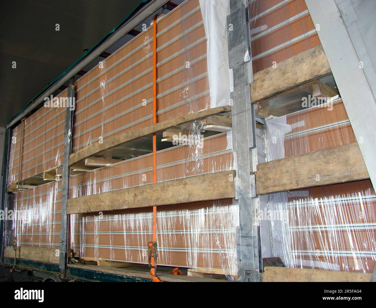 The cargo trailer is loaded with sandwich panels for warehouse ...