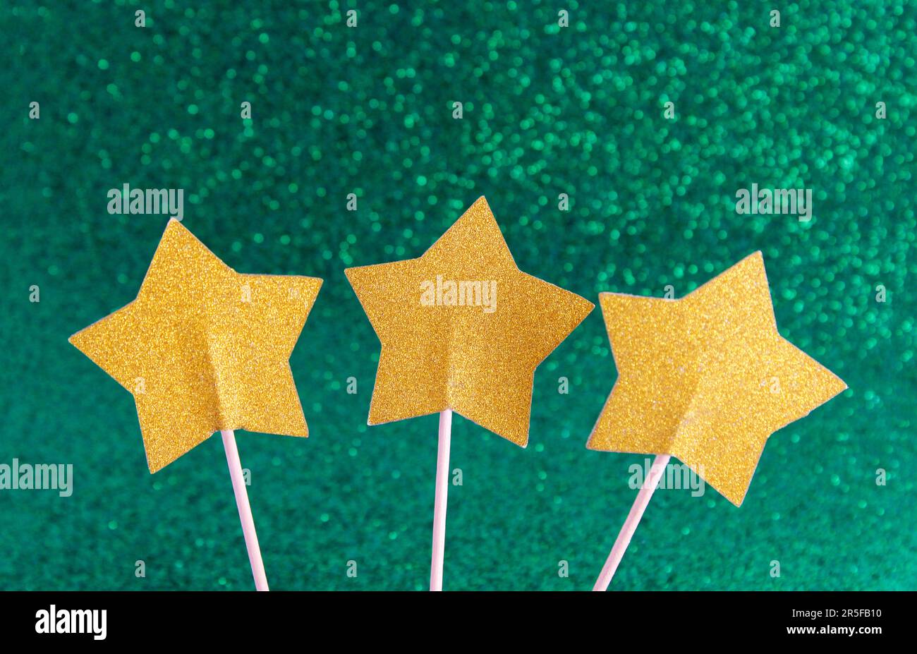 Three golden stars Stock Photo - Alamy
