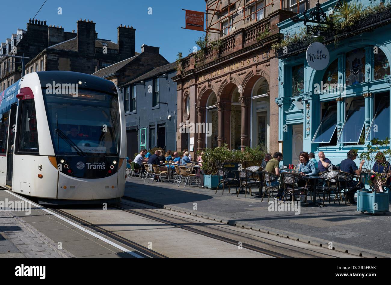 Edinburgh Scotland, UK 03 June 2023. People sit outside a cafe in Leith ...