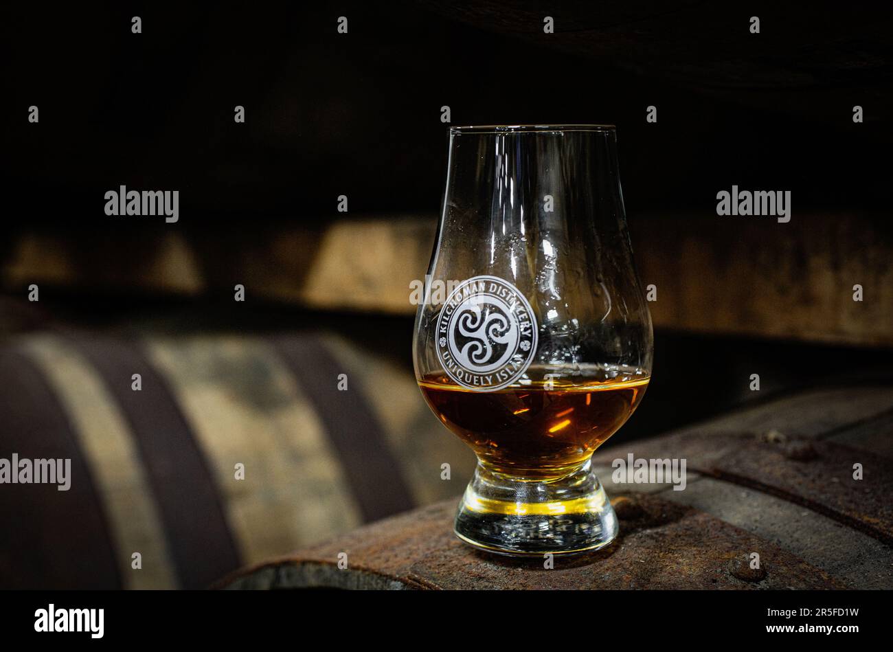 Dram of whisky standing on barrel, Kilchoman distillery , Islay ...