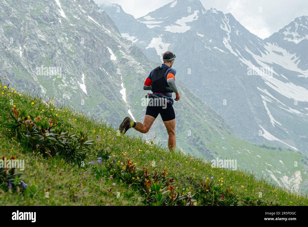 Running foot on grass hi-res stock photography and images - Alamy