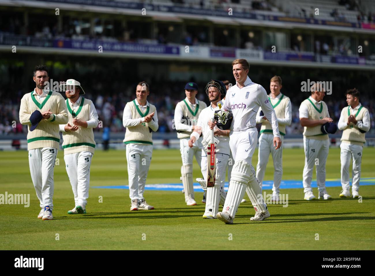The Ireland team claps England’s Zak Crawley and England’s Ben Duckett ...