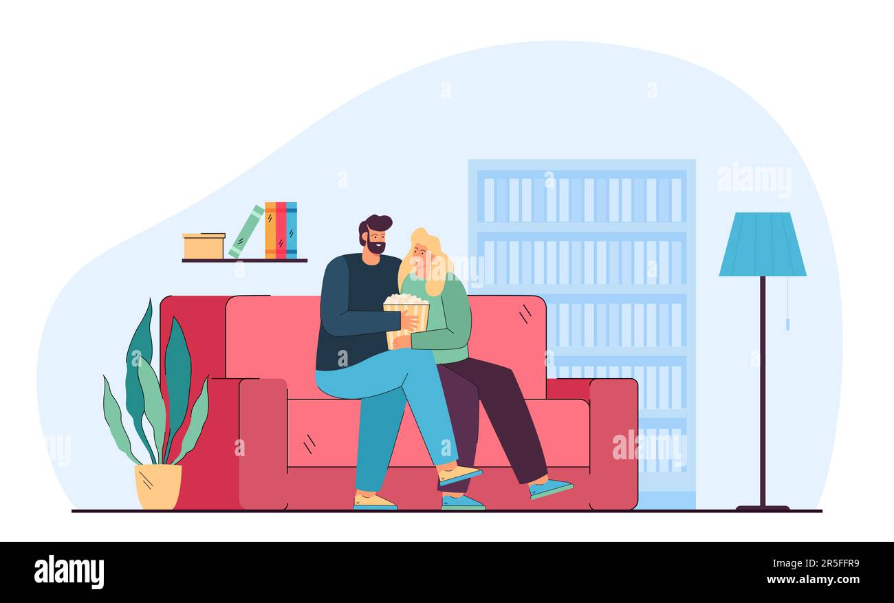 Couple watching movie or TV series with popcorn on cozy sofa Stock ...