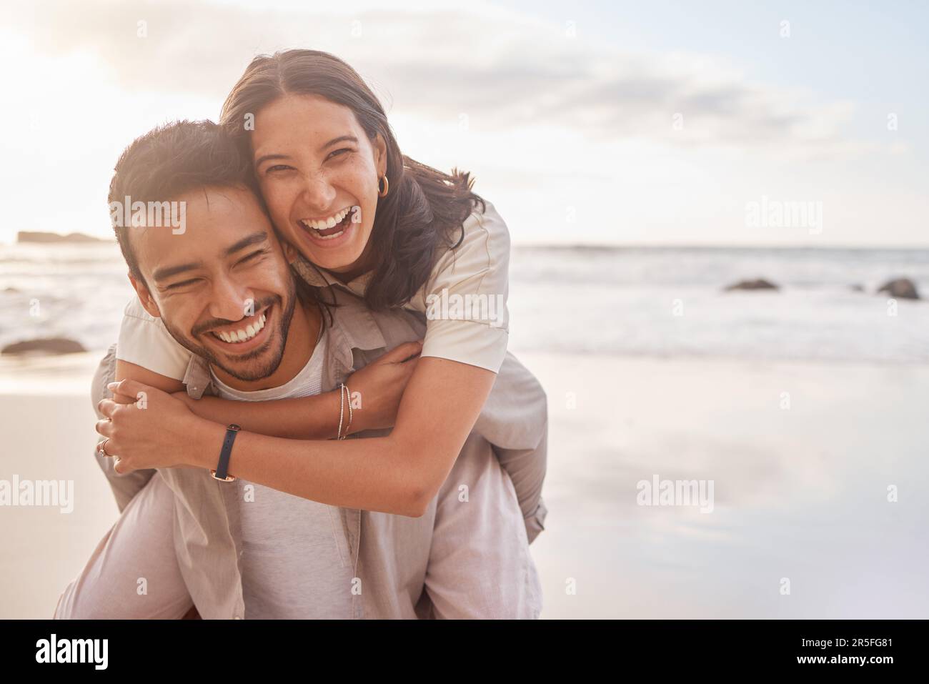 Couple, portrait and hug at the beach with happiness on vacation for ...