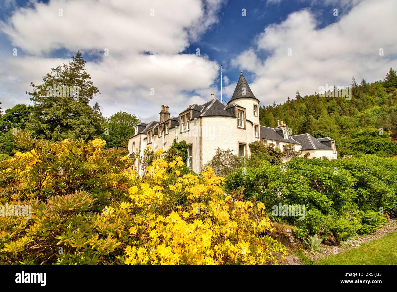 Attadale Gardens Wester Ross Scotland blue sky over the white house in ...