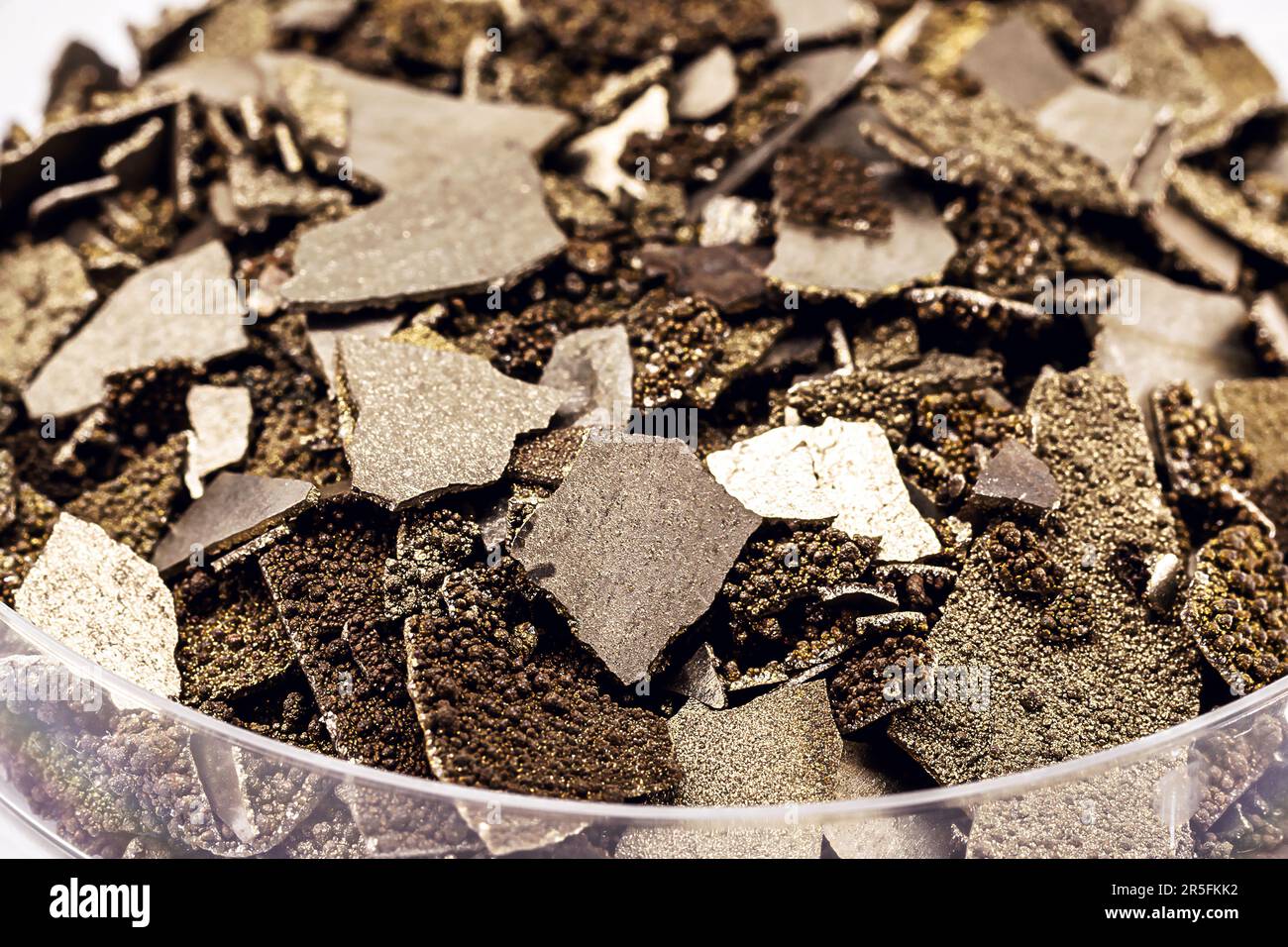 Manganese samples in petri dish, pure manganese metal flakes used in ...