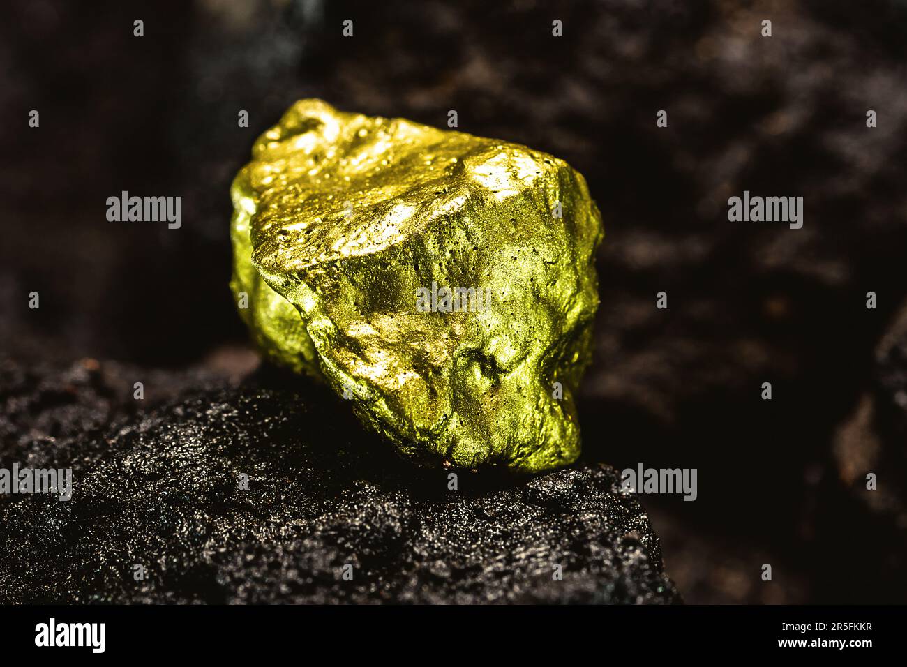 gold nugget in mine, concept of precious stone excavation Stock Photo ...